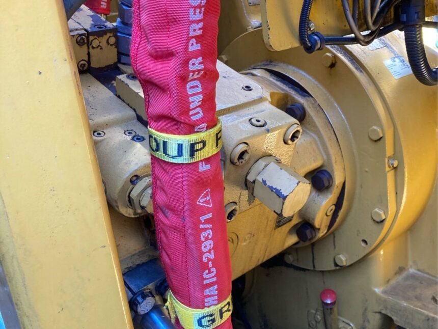 Customised Hydraulic Hose Burst Sleeving protecting Maintainers