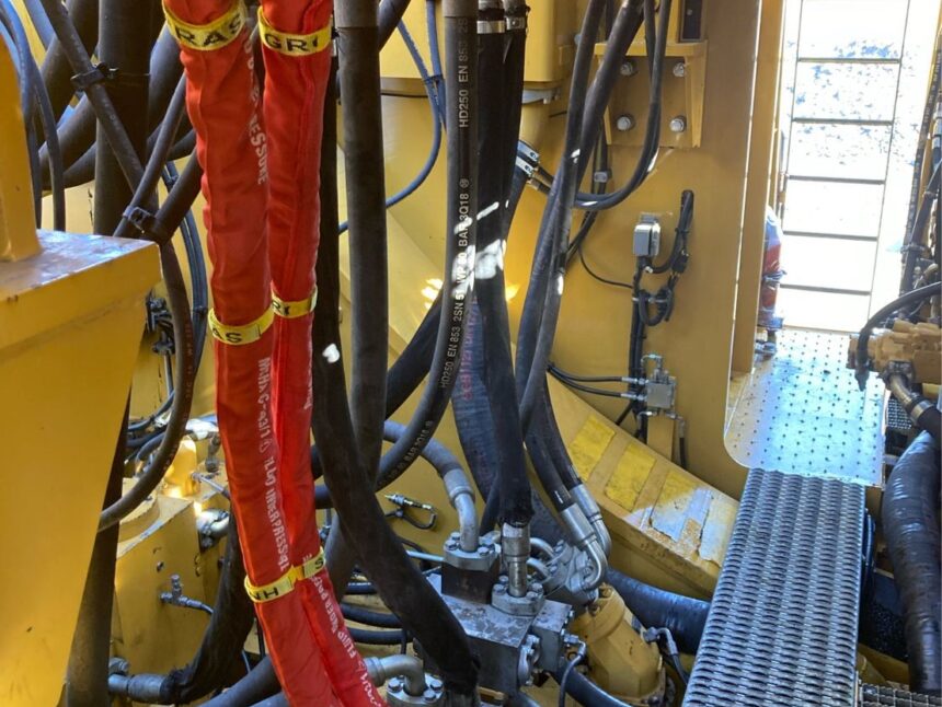 Customised Hydraulic Hose Burst Sleeving protecting Maintainers