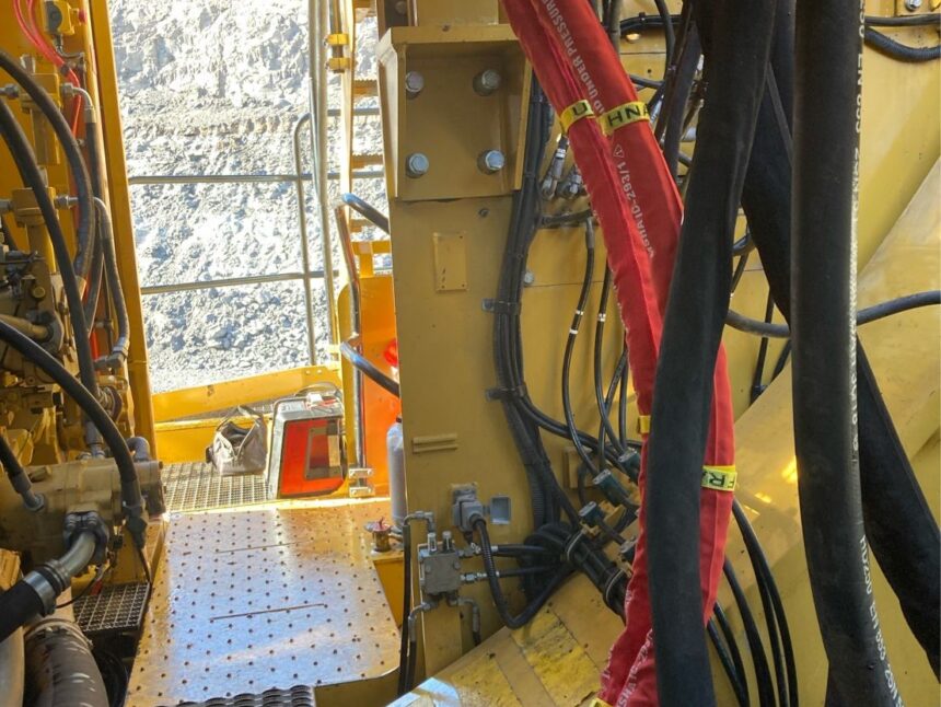 Customised Hydraulic Hose Burst Sleeving protecting Maintainers