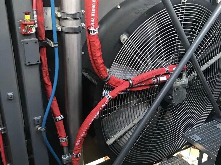 Customised Hydraulic Hose Burst Sleeving protecting Maintainers